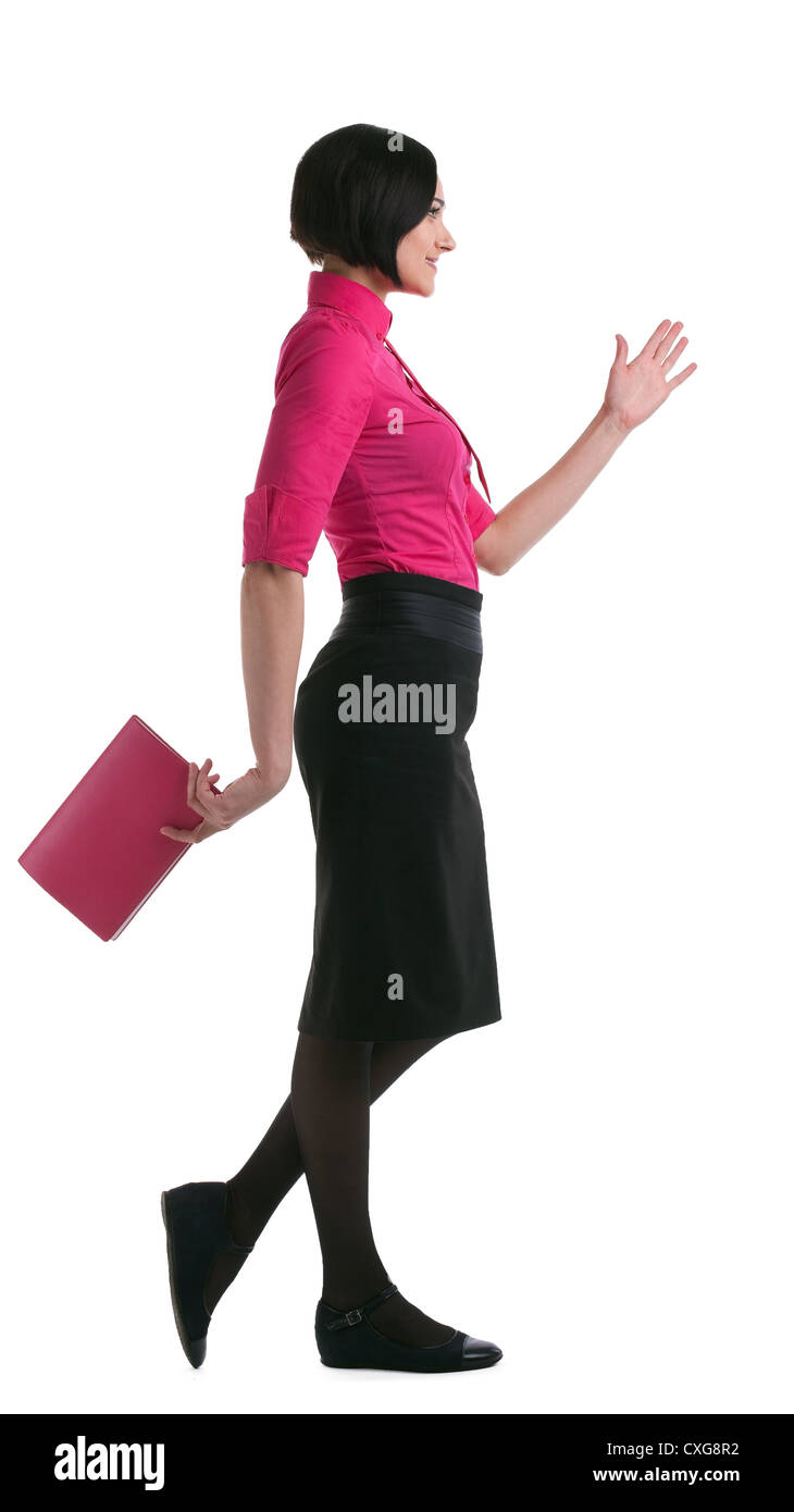 young business woman walk forward with plan Stock Photo - Alamy