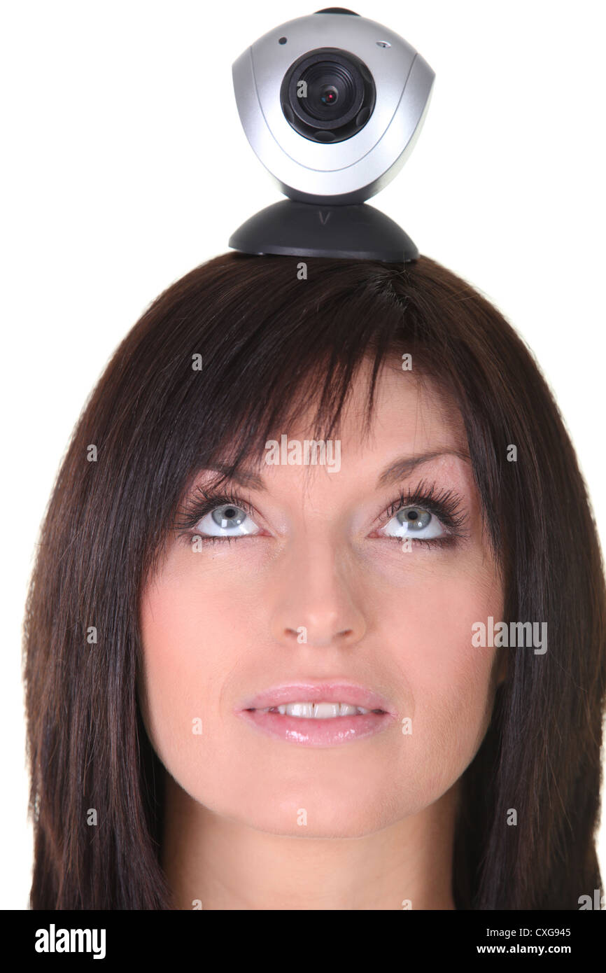 Woman with a webcam balanced on her head Stock Photo - Alamy