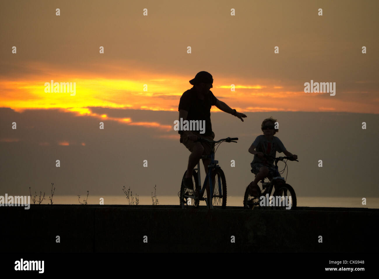 Father Son Cycling Sunset High Resolution Stock Photography and Images ...