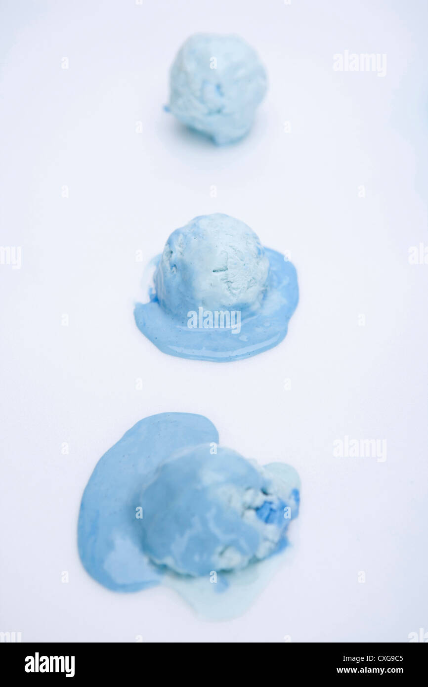 ice cream melting down Stock Photo - Alamy