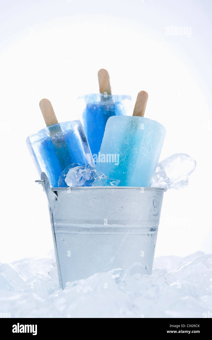 blue ice bars in the bucket Stock Photo - Alamy