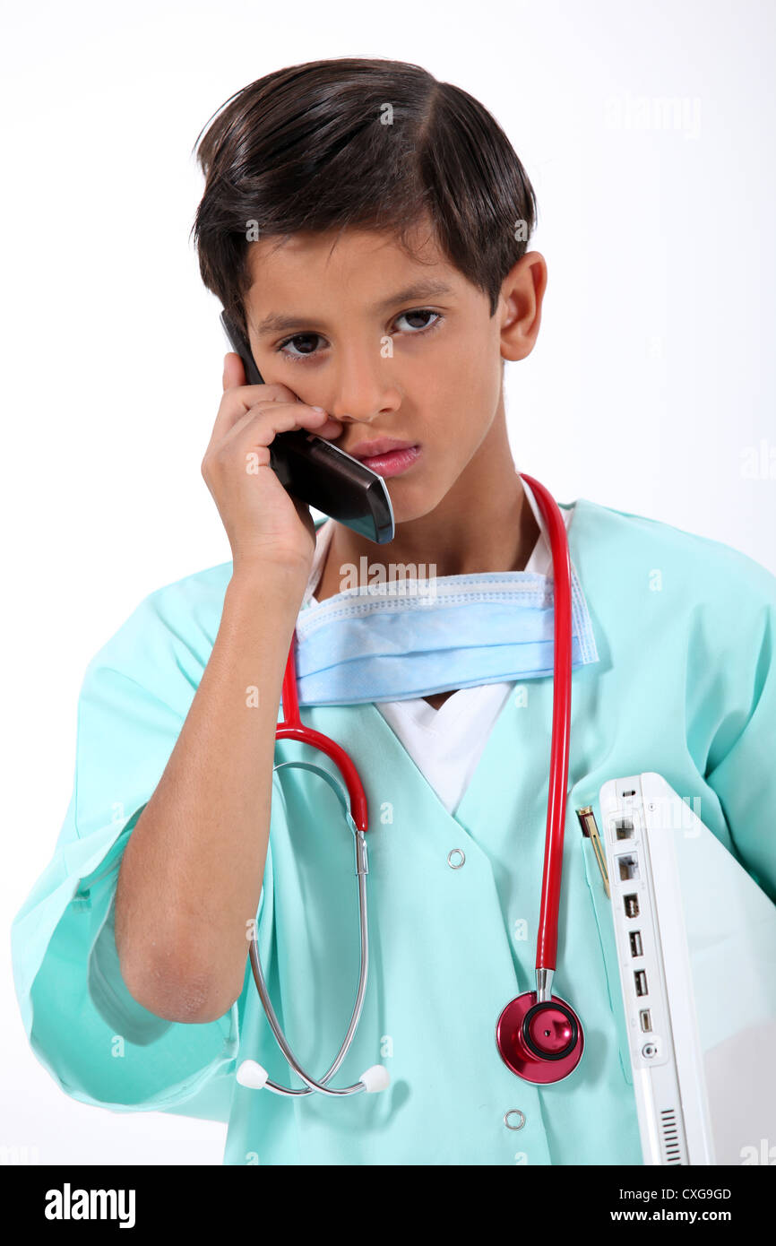 Nurse dressing boy hi-res stock photography and images - Alamy