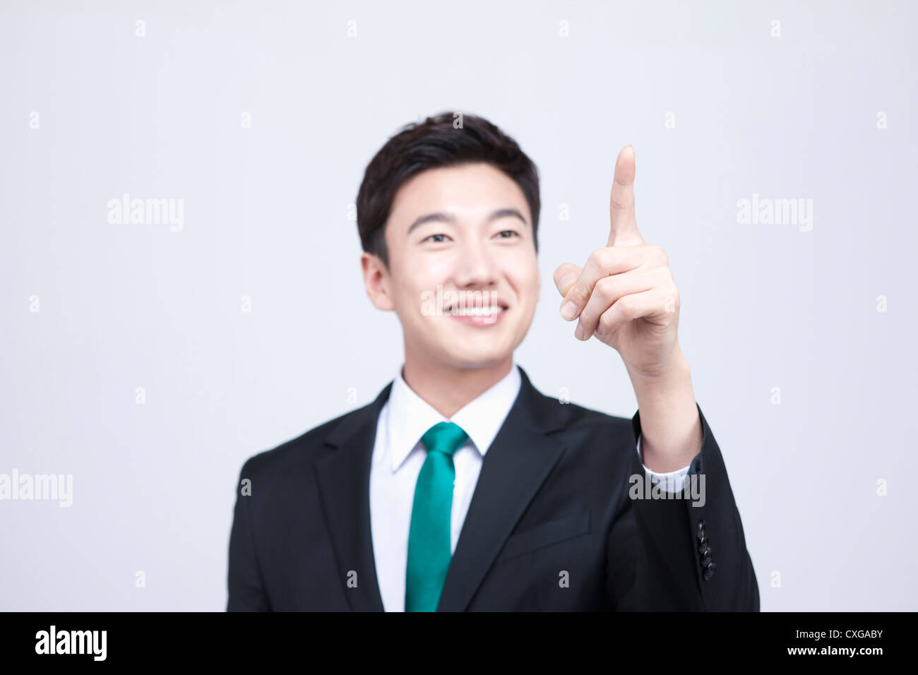 man pointing out with his index finger Stock Photo - Alamy