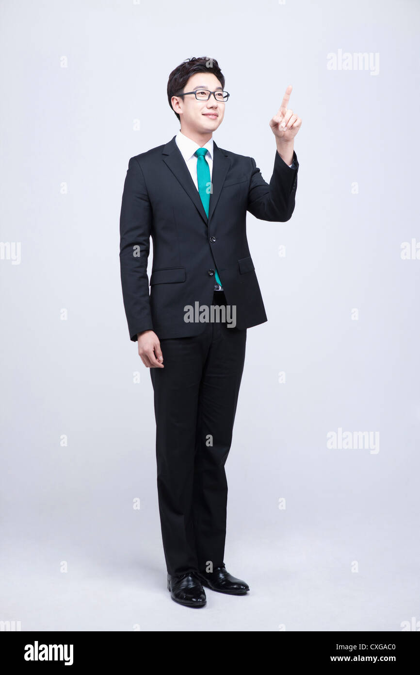 man pointing out with his index finger Stock Photo - Alamy