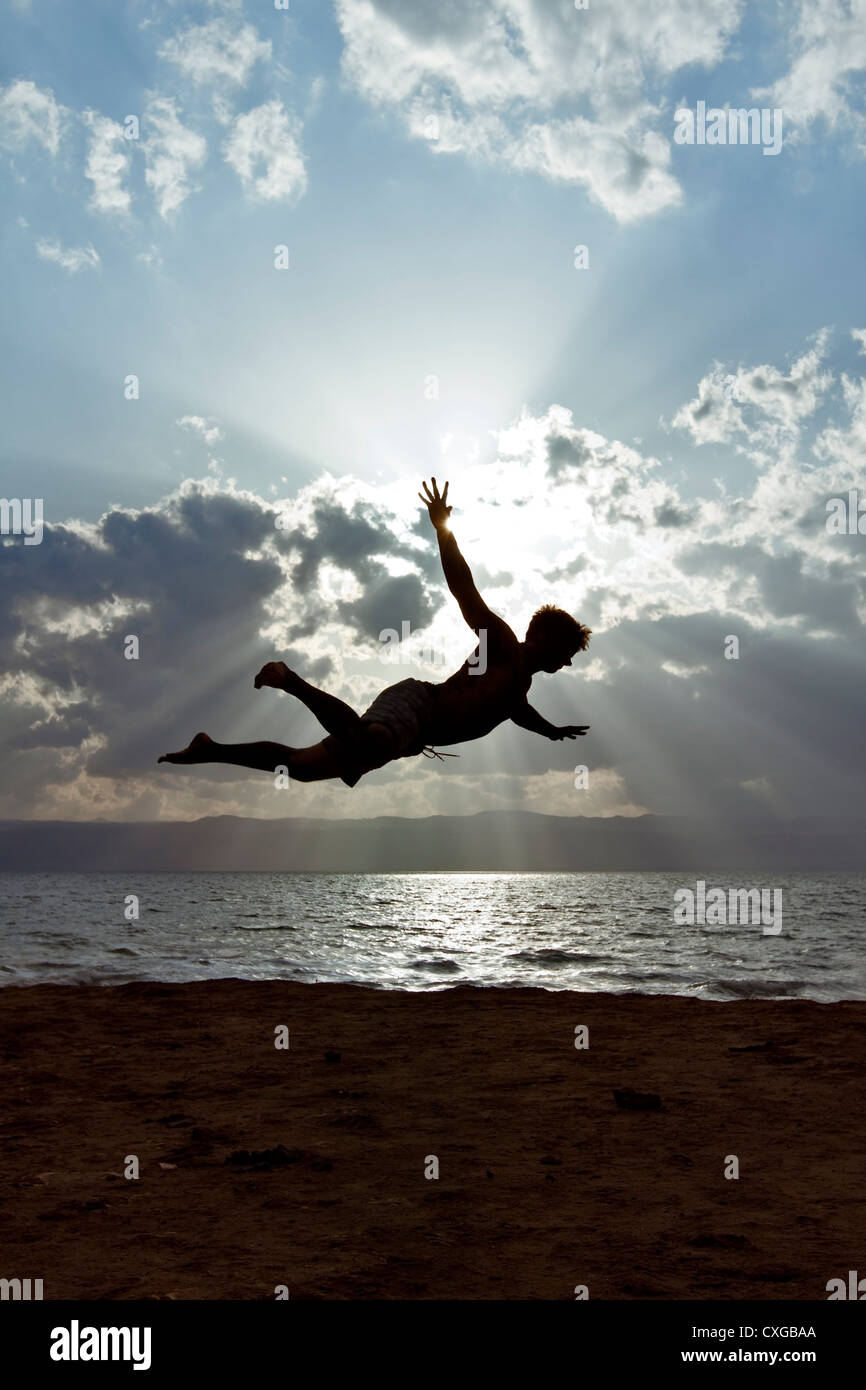 One person acrobatic jumping scene symbolize vitality, aspiration ...