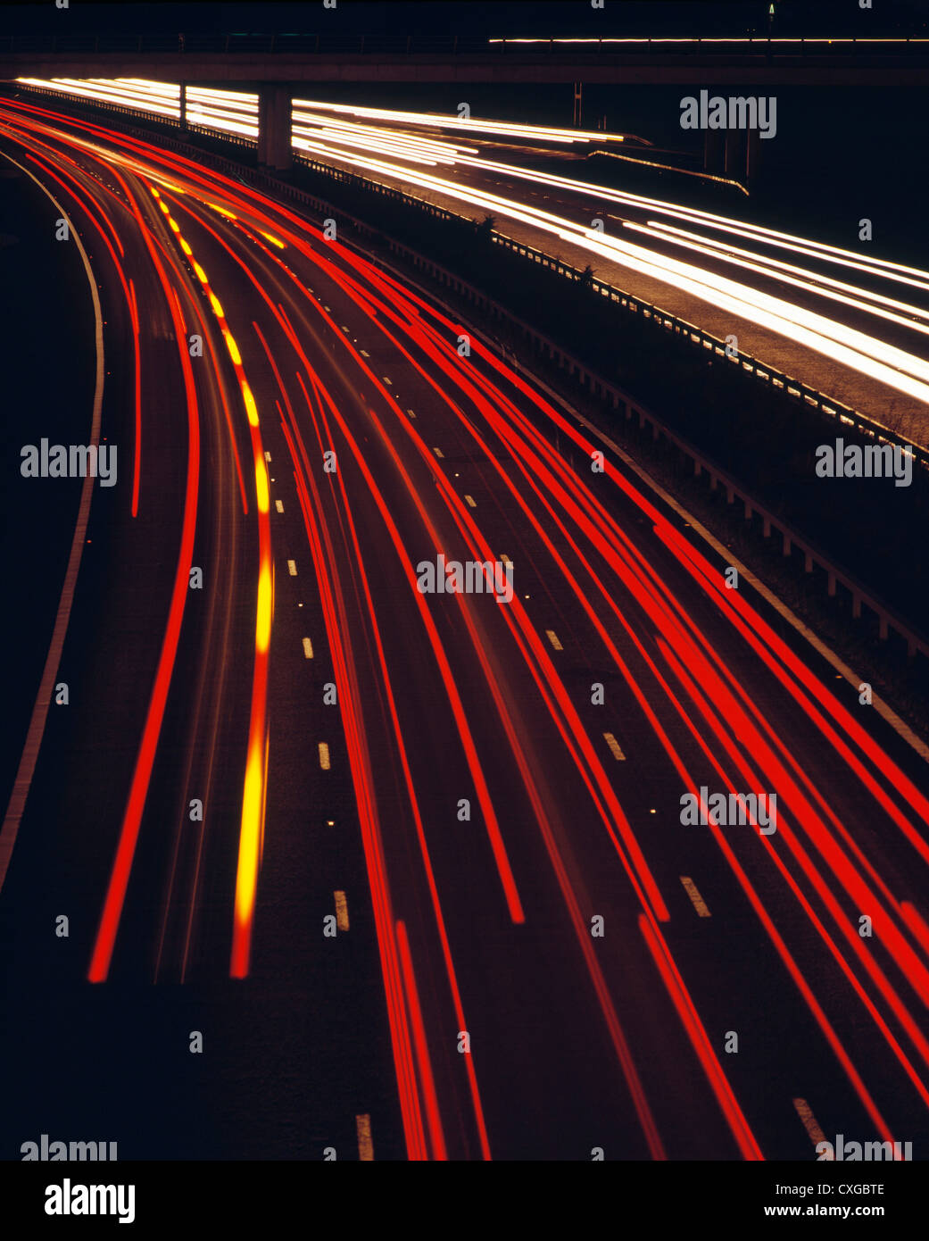 Vehicles on the M25 at night, Chertsey, Surrey, England Stock Photo - Alamy