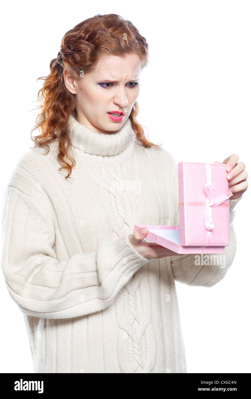 Portrait of a sad girl with a gift Stock Photo - Alamy