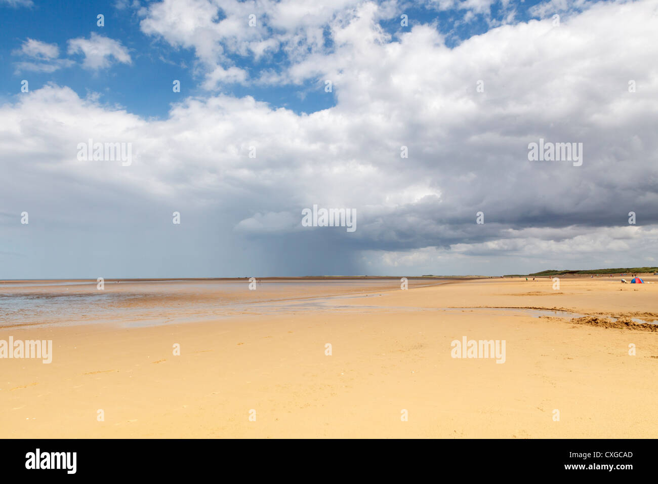 Sandy beach and wide open sky of Bancaster bay. North Norfolk Stock ...