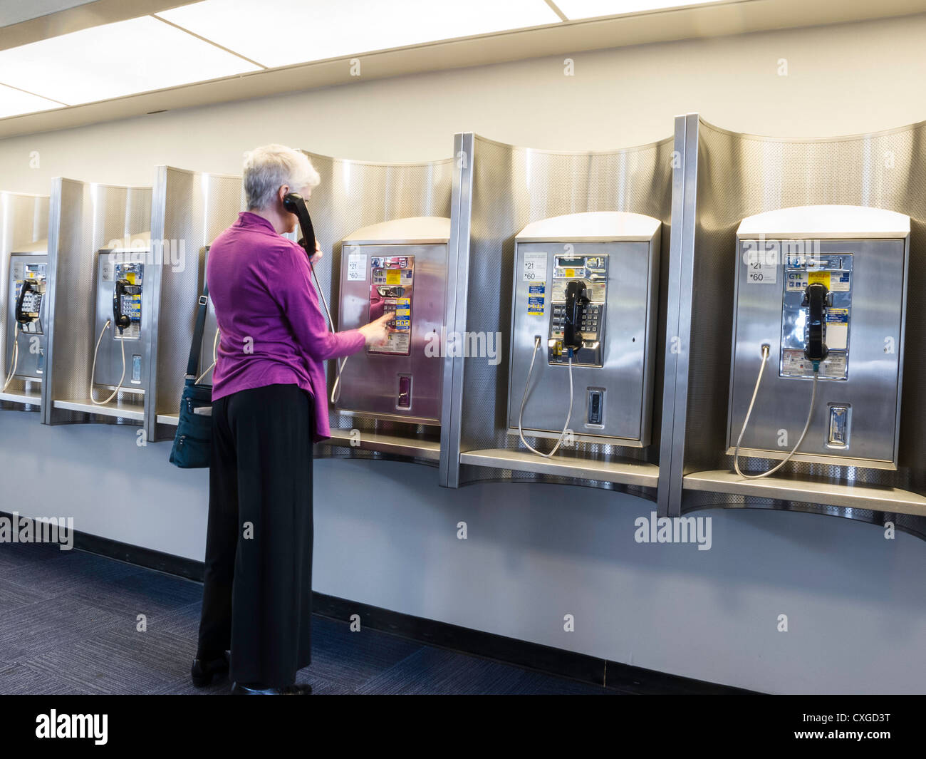 Mature Woman Using Public Pay Phone, Newark Liberty International ...