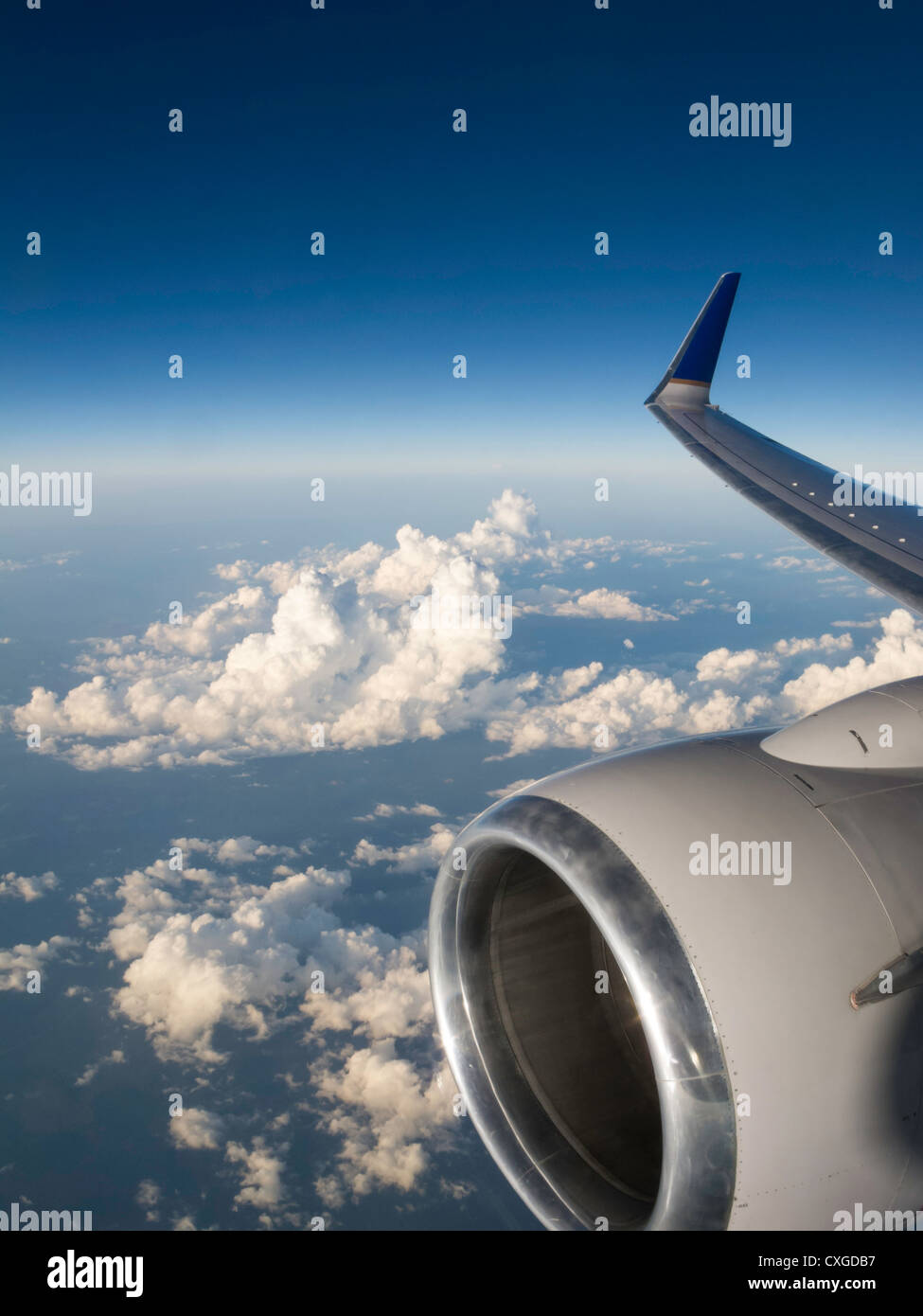 Jet Plane Wing and Engine from Cabin Window in Flight Stock Photo - Alamy
