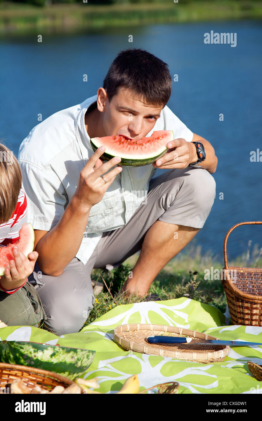 man eating watermelon Stock Photo - Alamy