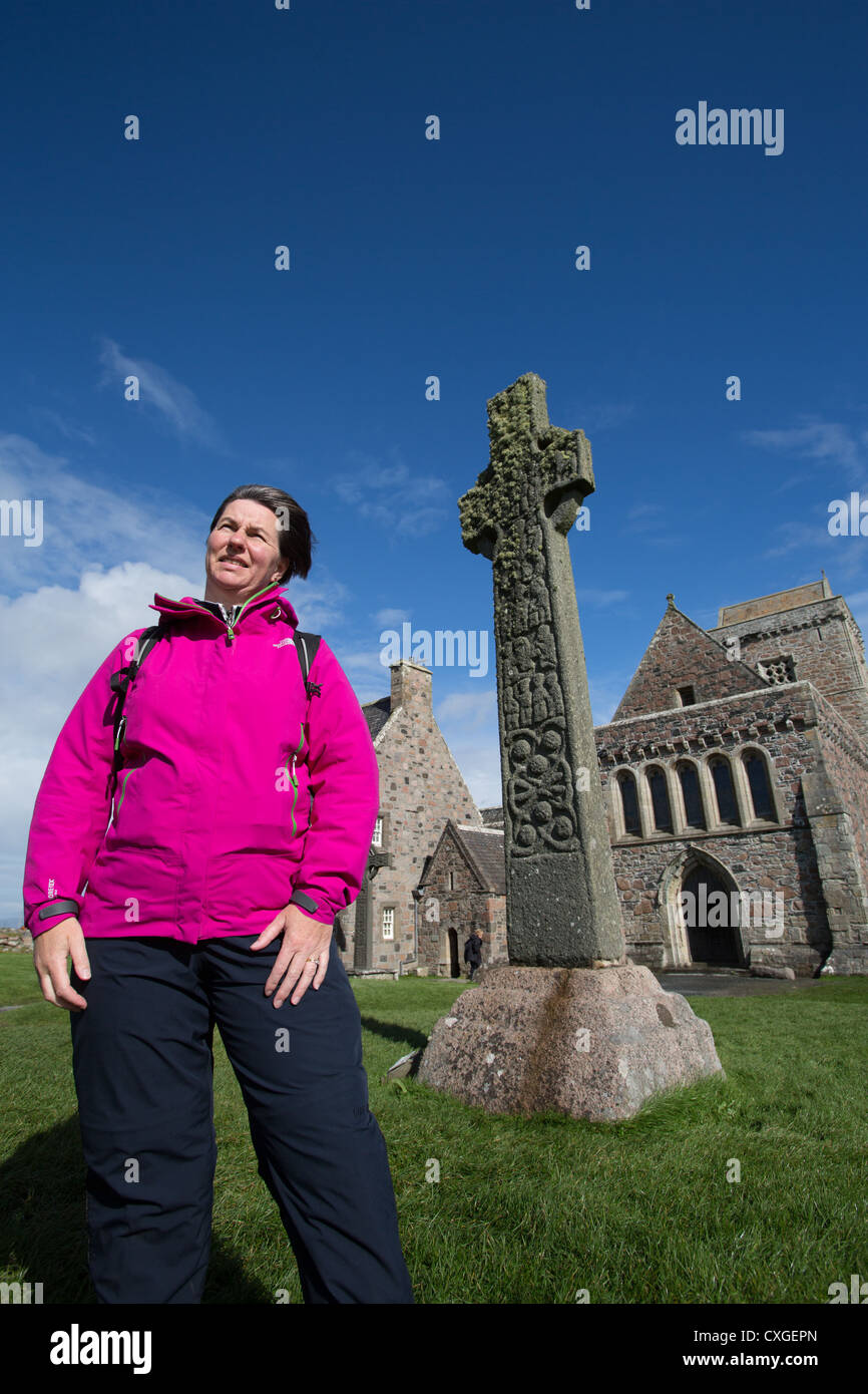 Isle of Iona, Scotland Low angled view of a lady tourist visiting Iona ...