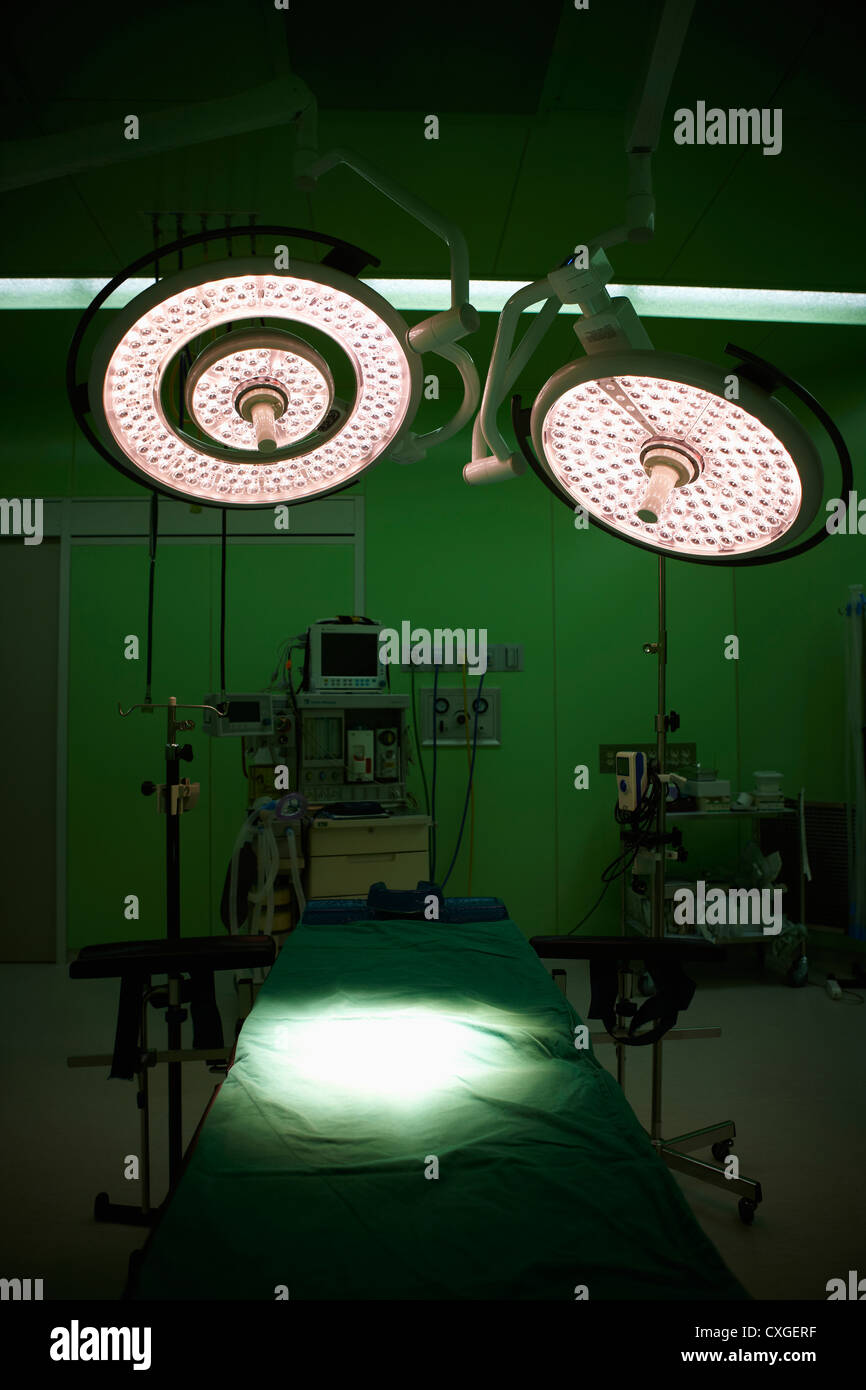 A picture of surgery room with surgery bed and lights Stock Photo - Alamy