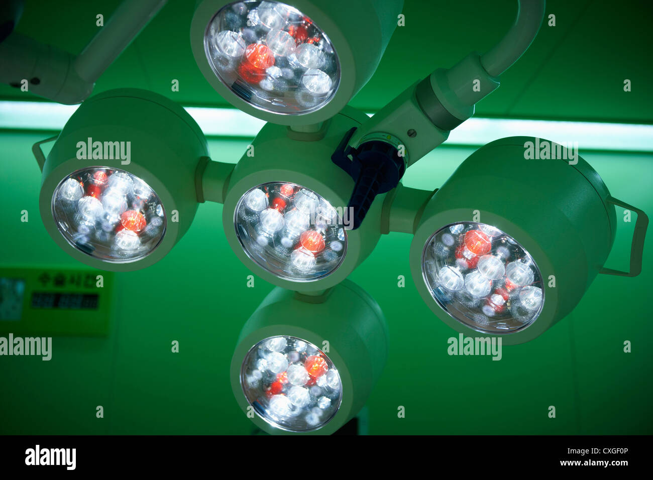 Five Surgical lights in a operating room Stock Photo - Alamy