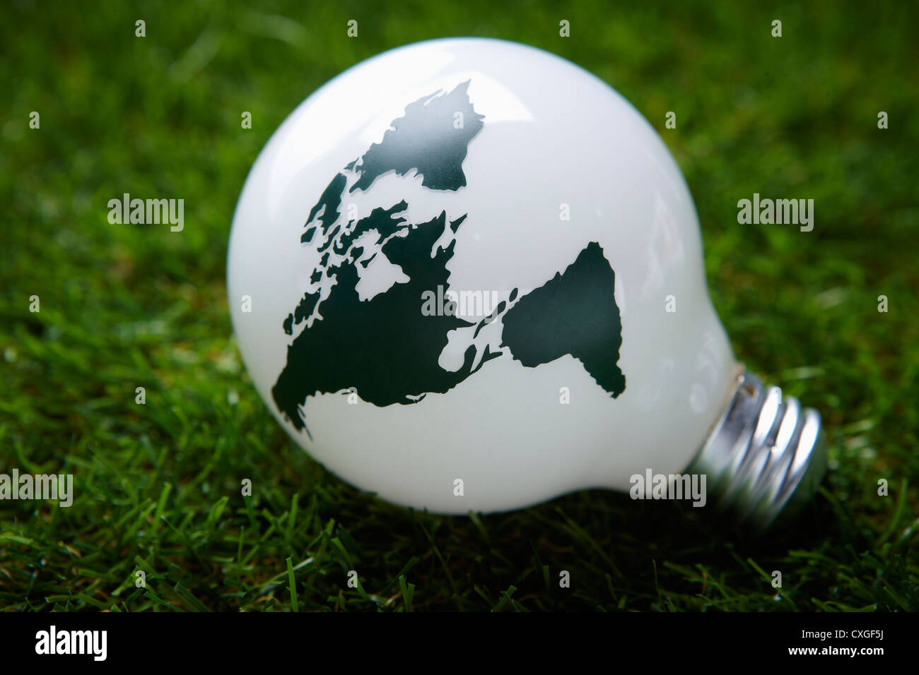A light bulb of earth placed on grass Stock Photo - Alamy