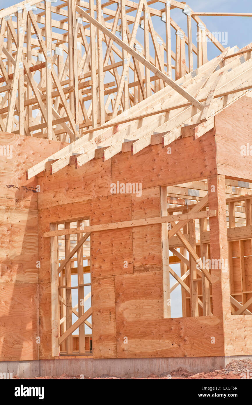 Wooden framework on a cement foundation of large new buildings Stock ...