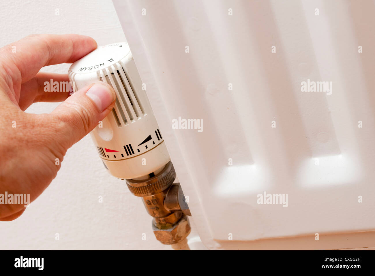 temperature control valve on a radiator Stock Photo - Alamy