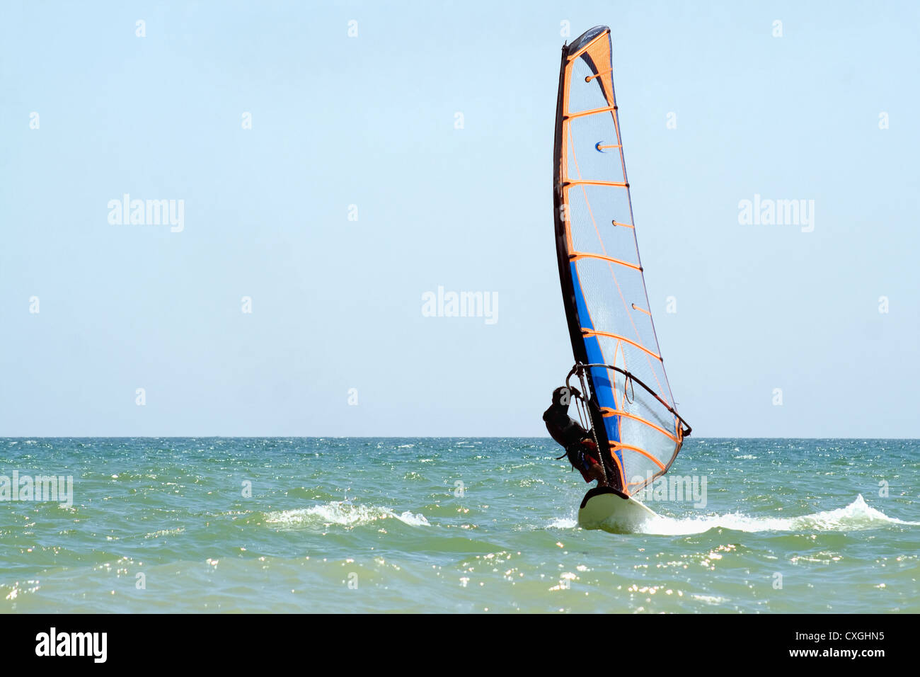windsurfer on the sea surface Stock Photo - Alamy