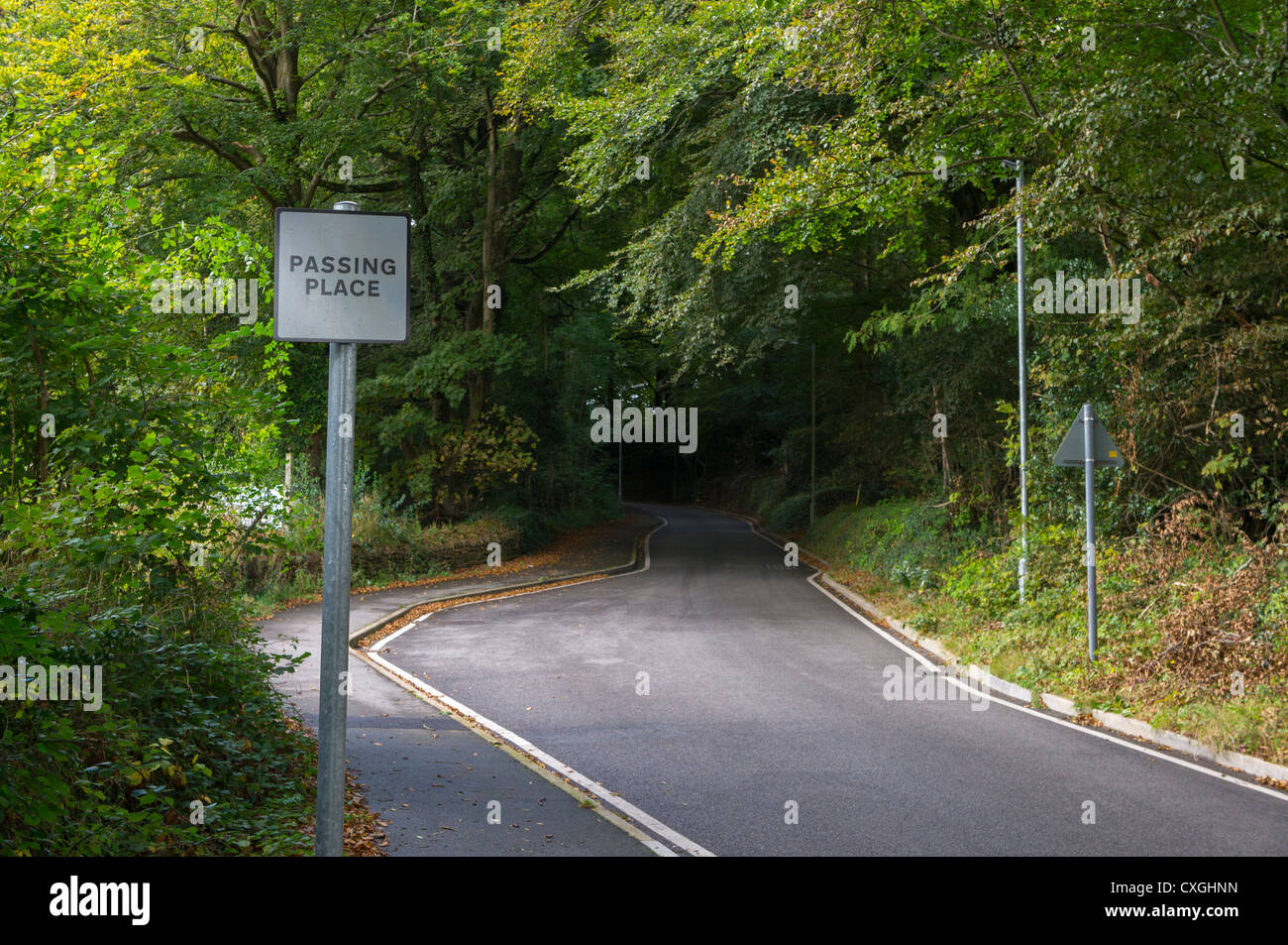 Passing Place sign on a narrow stretch of road, Duporth Cornwall UK ...