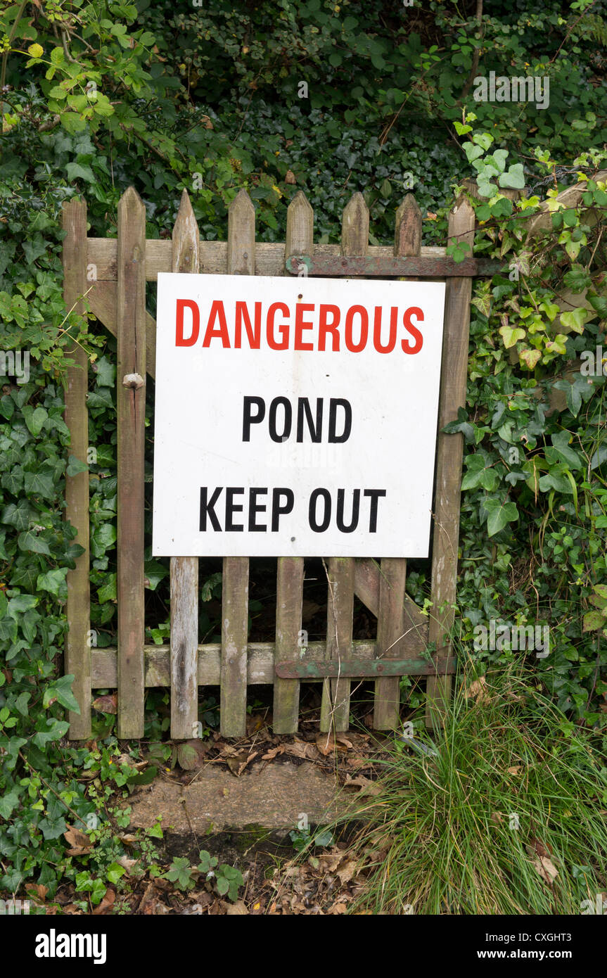 Dangerous Pond sign on gate, Charlestown UK Stock Photo - Alamy