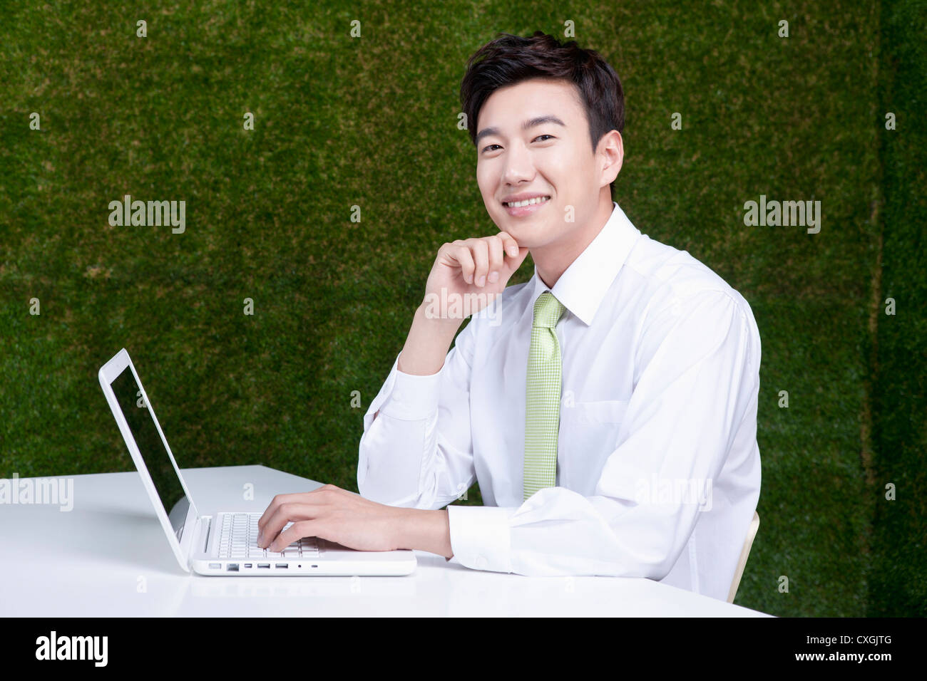 man using computer on the table Stock Photo - Alamy