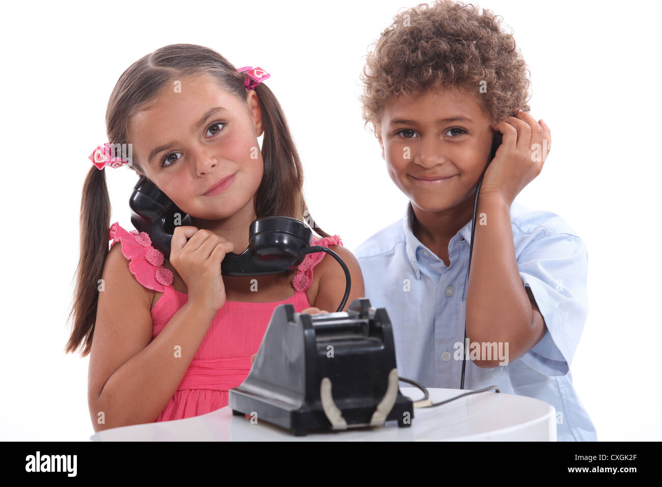 Children on the phone Stock Photo - Alamy