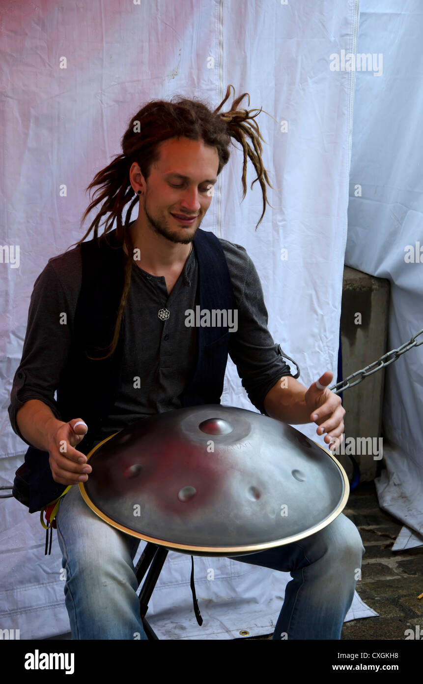 Man playing PANart unusual percussive instrument busking in the Royal ...