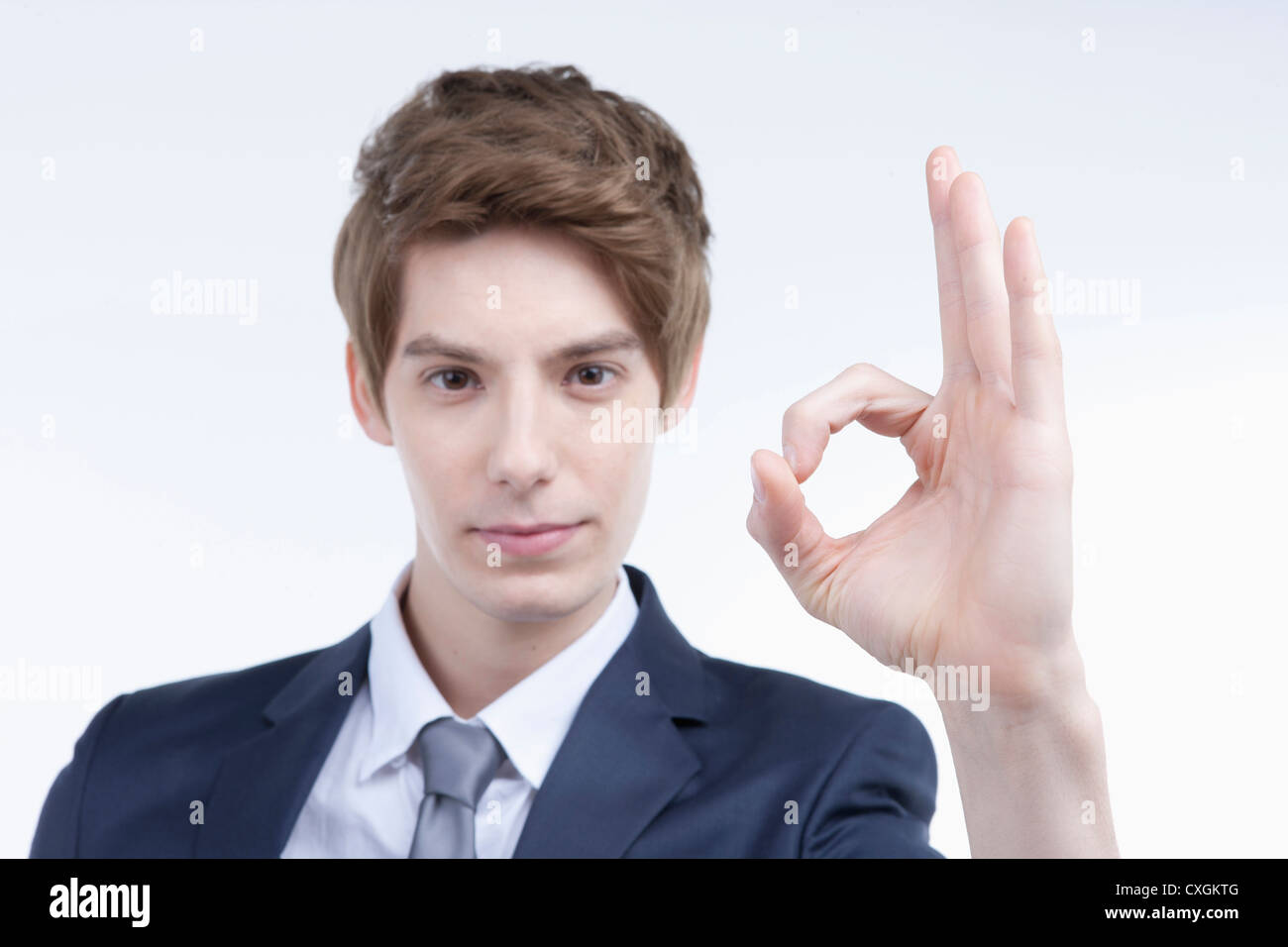 businessman making a OK sign Stock Photo - Alamy