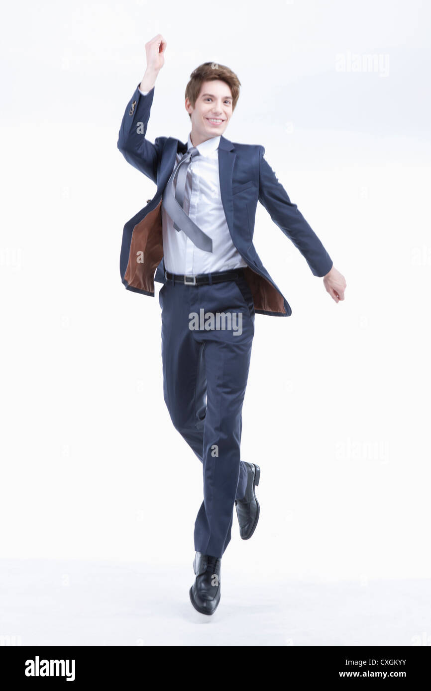 businessman jumping with excitement Stock Photo - Alamy