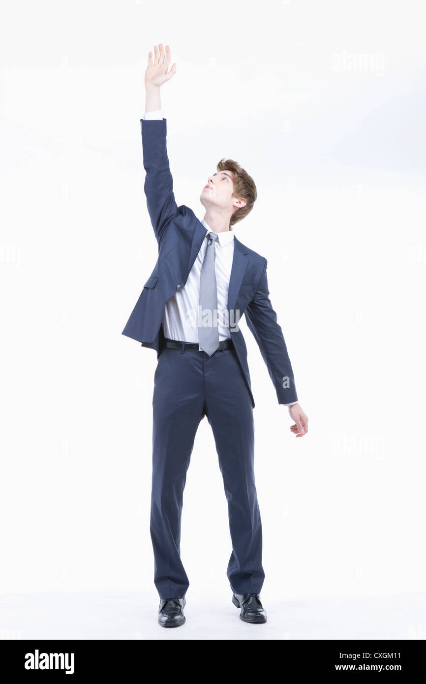 businessman reaching out his hand Stock Photo - Alamy