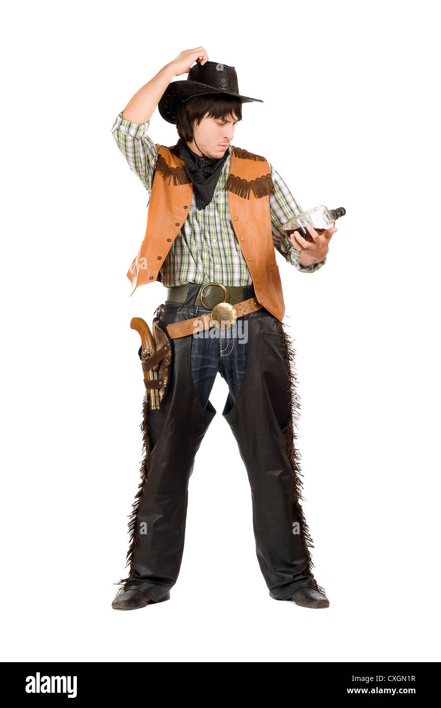 Pensive young cowboy with a bottle Stock Photo - Alamy