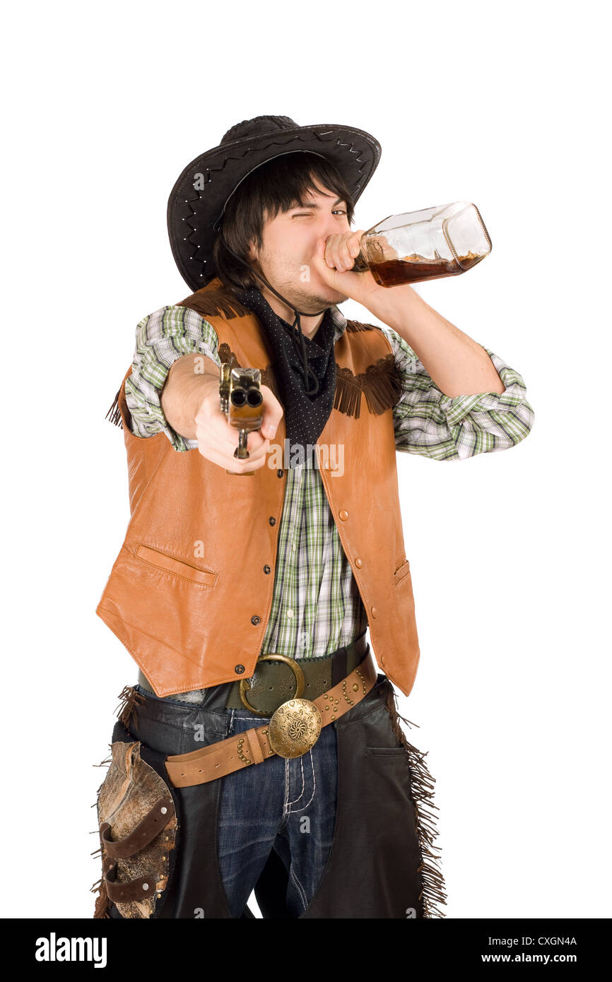 Cowboy drinking whiskey from the bottle Stock Photo - Alamy