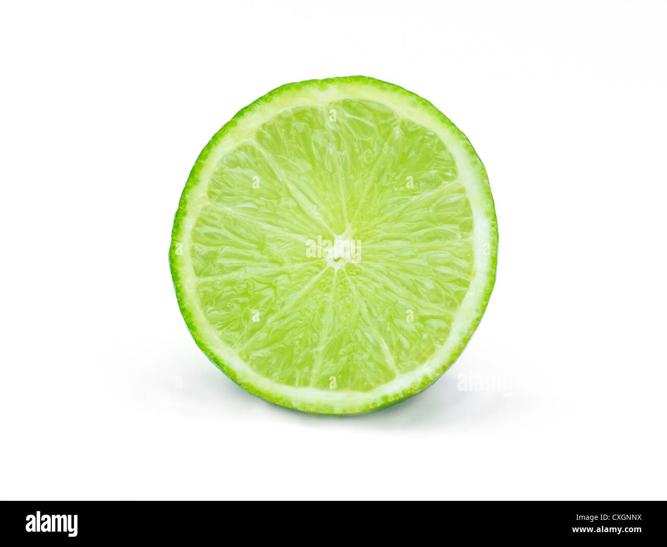 Juicy sliced lime on white hi-res stock photography and images - Alamy