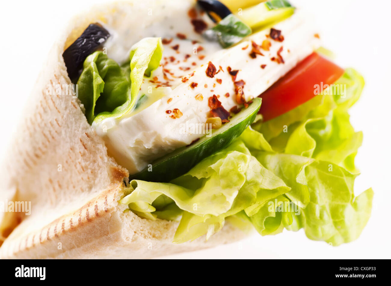 Pita bread stuffed with Feta and vegetables Stock Photo - Alamy