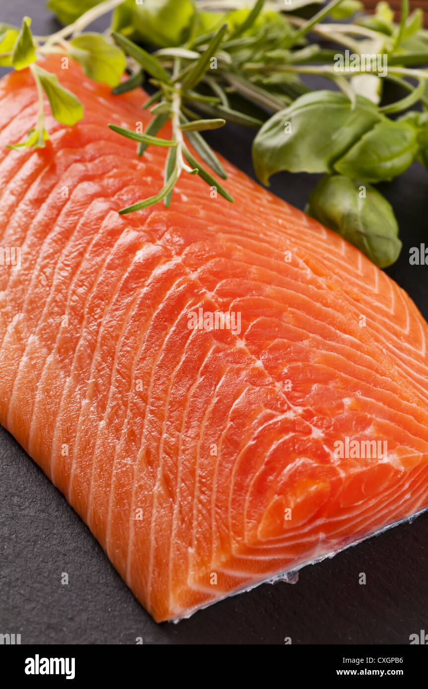 Salmon fillet on the slate plate Stock Photo - Alamy