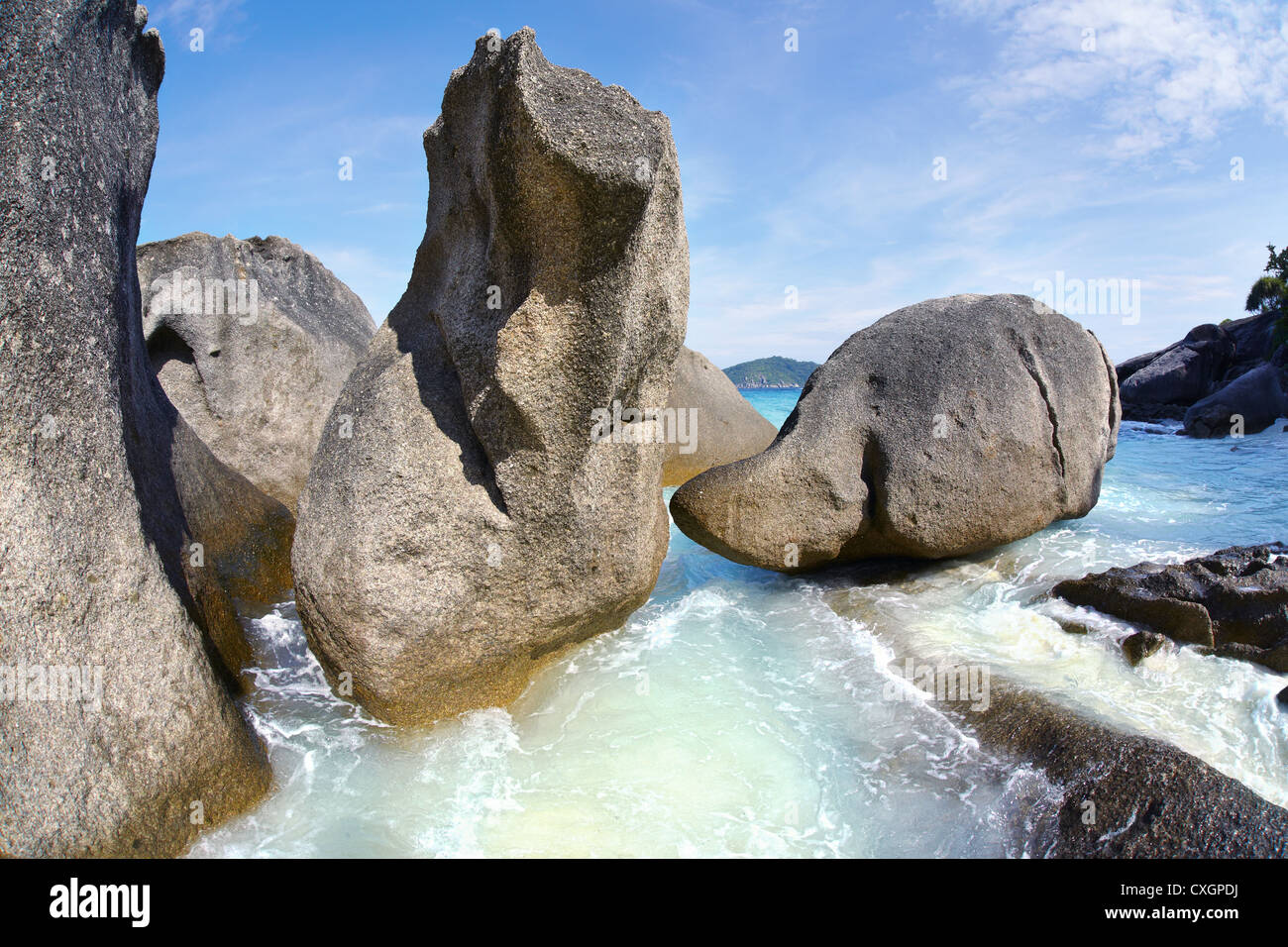 Boulders and ocean Stock Photo - Alamy