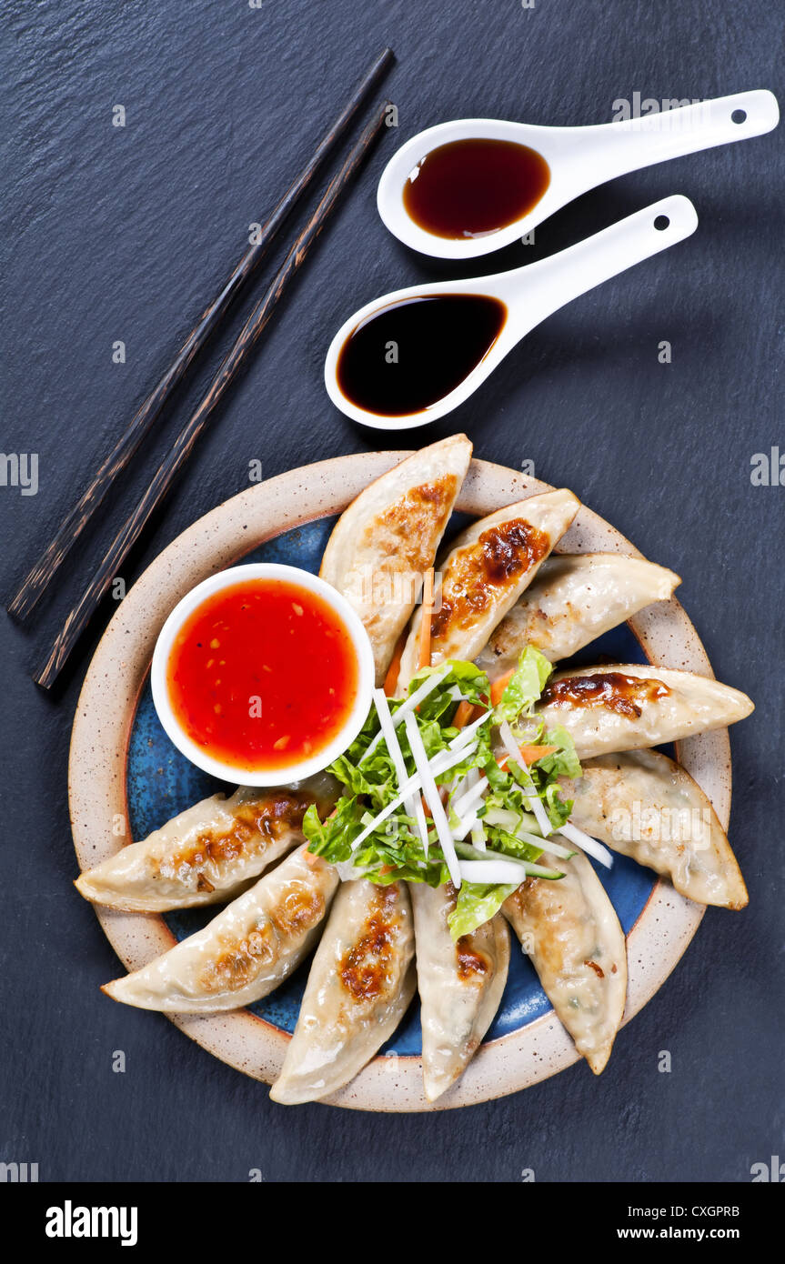 Fried Guotie with dipping sauces Stock Photo - Alamy