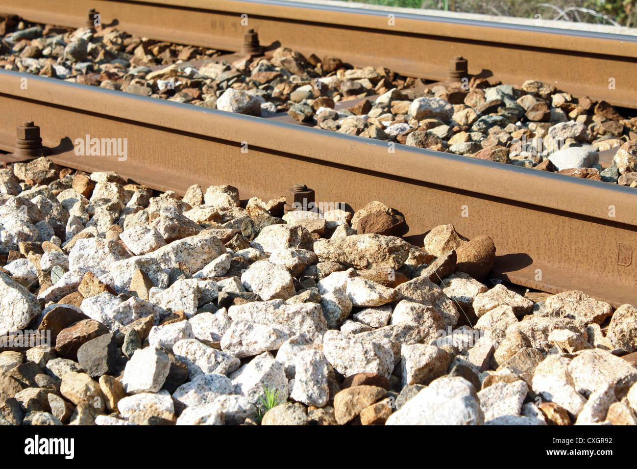 Detail of stones for the construction of railway track Stock Photo - Alamy