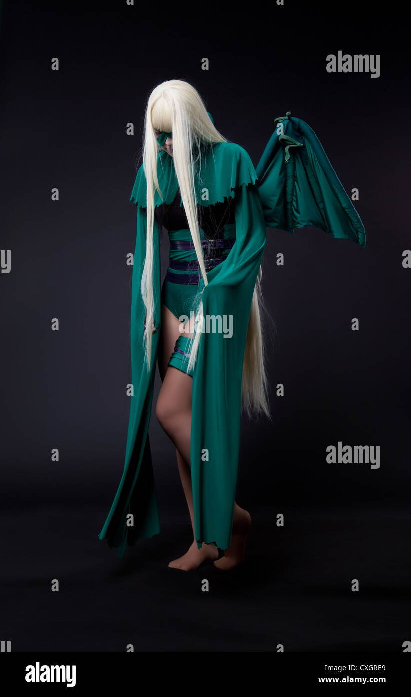blond girl in green fury cosplay character Stock Photo - Alamy