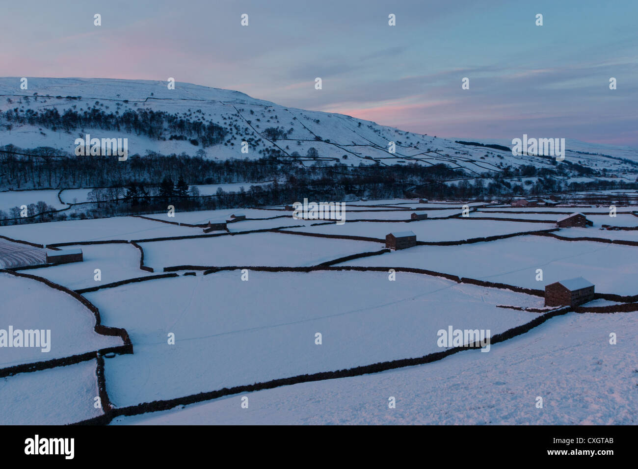 Gunnerside barns in winter, Yorkshire Dales, sunset, snow, fields ...