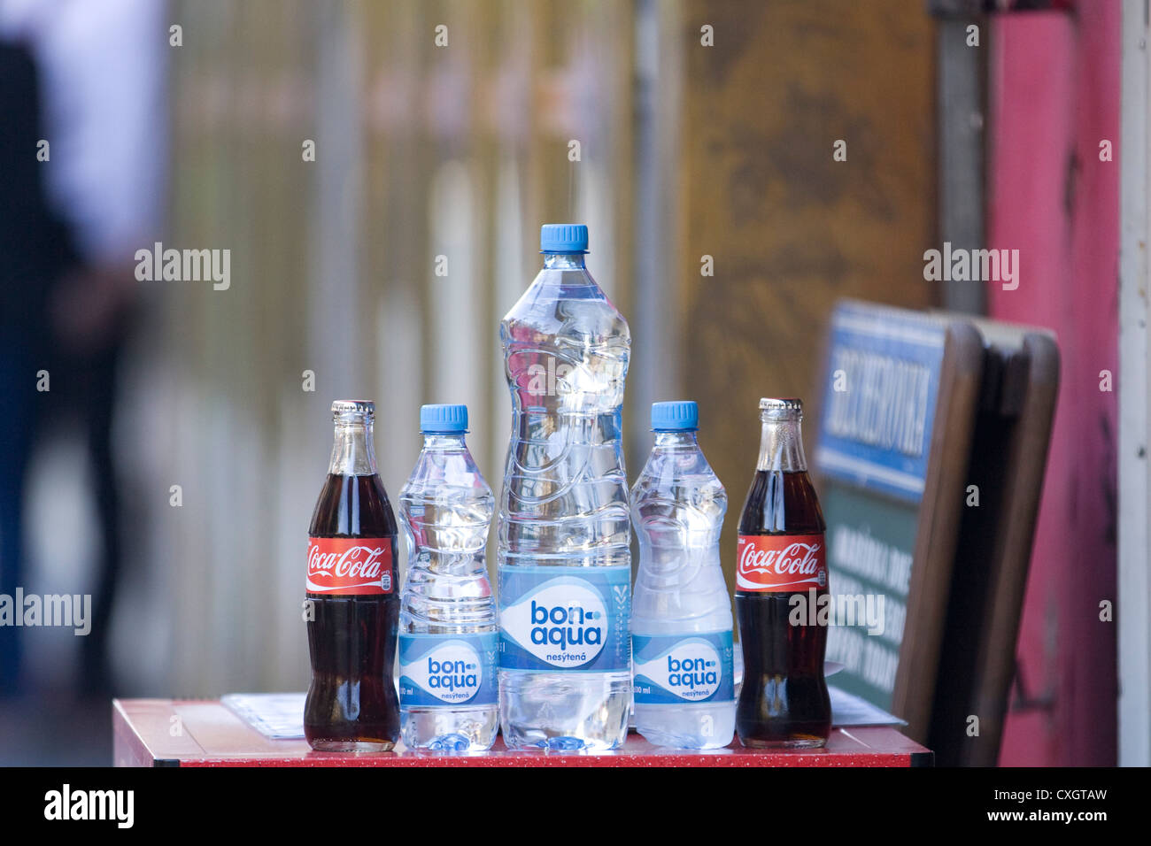 Bottles of coke and Bon Aqua water on a table in Prague Stock Photo - Alamy