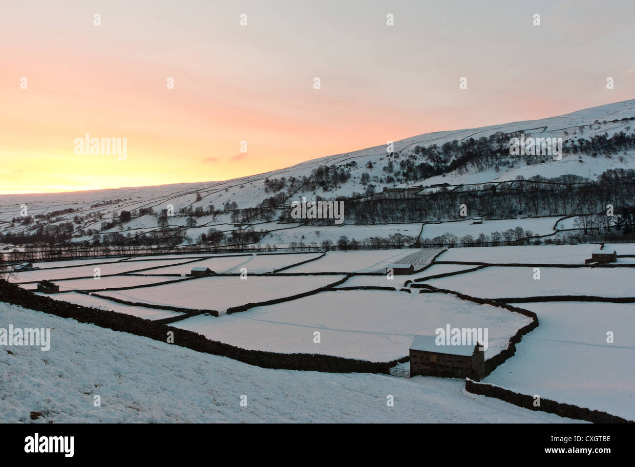 Gunnerside barns in winter, Yorkshire Dales, sunrise, snow, fields ...