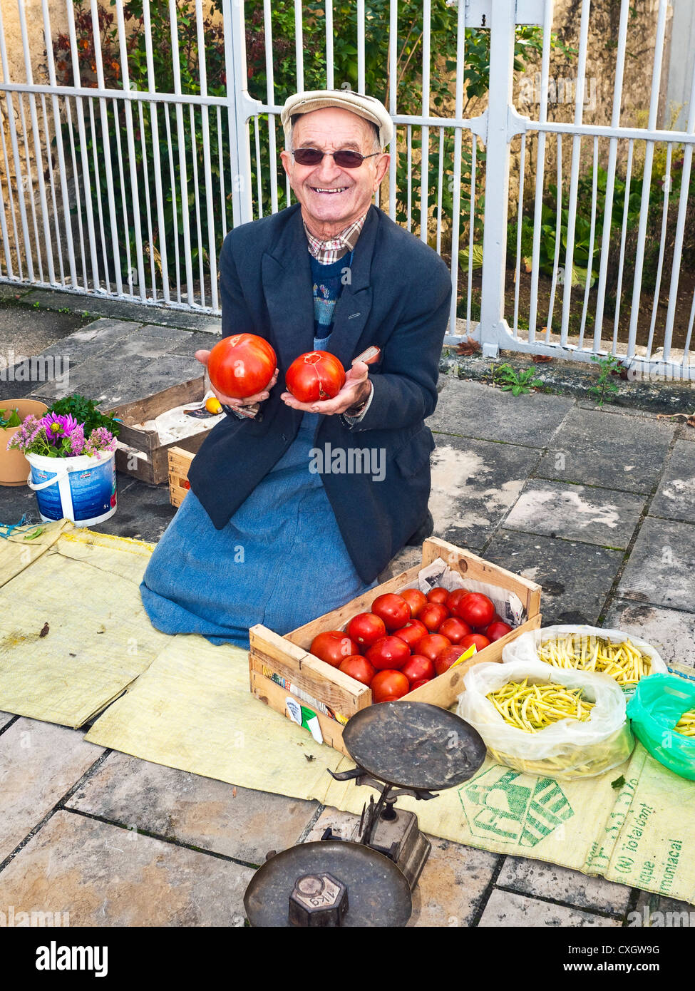 French man selling fruit and vegetables on pavement - France Stock ...