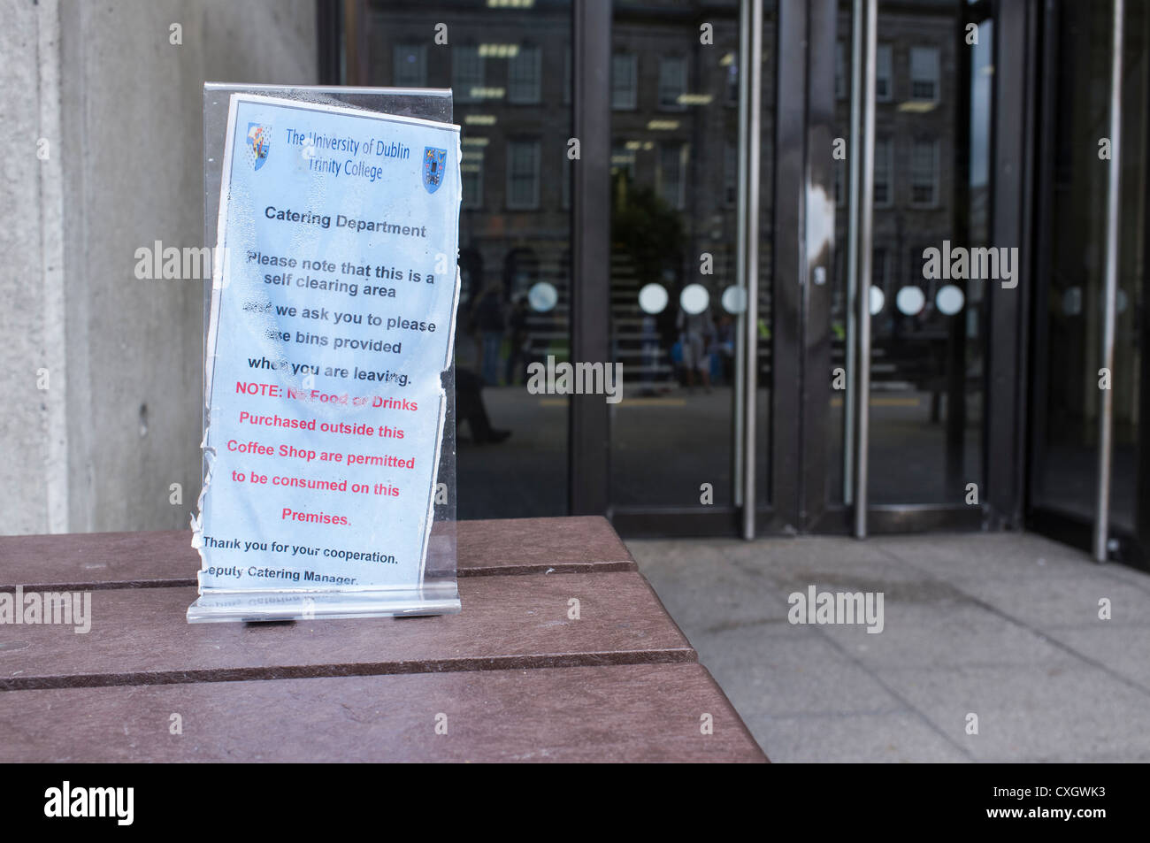 Notice on table in outside eating area, Trinity College, Dublin ...