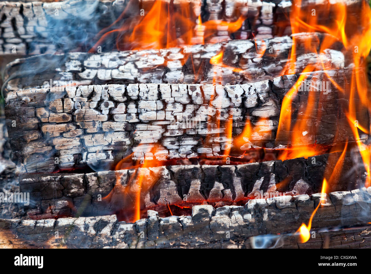 Closeup of a warm fire burning in a fireplace Stock Photo - Alamy