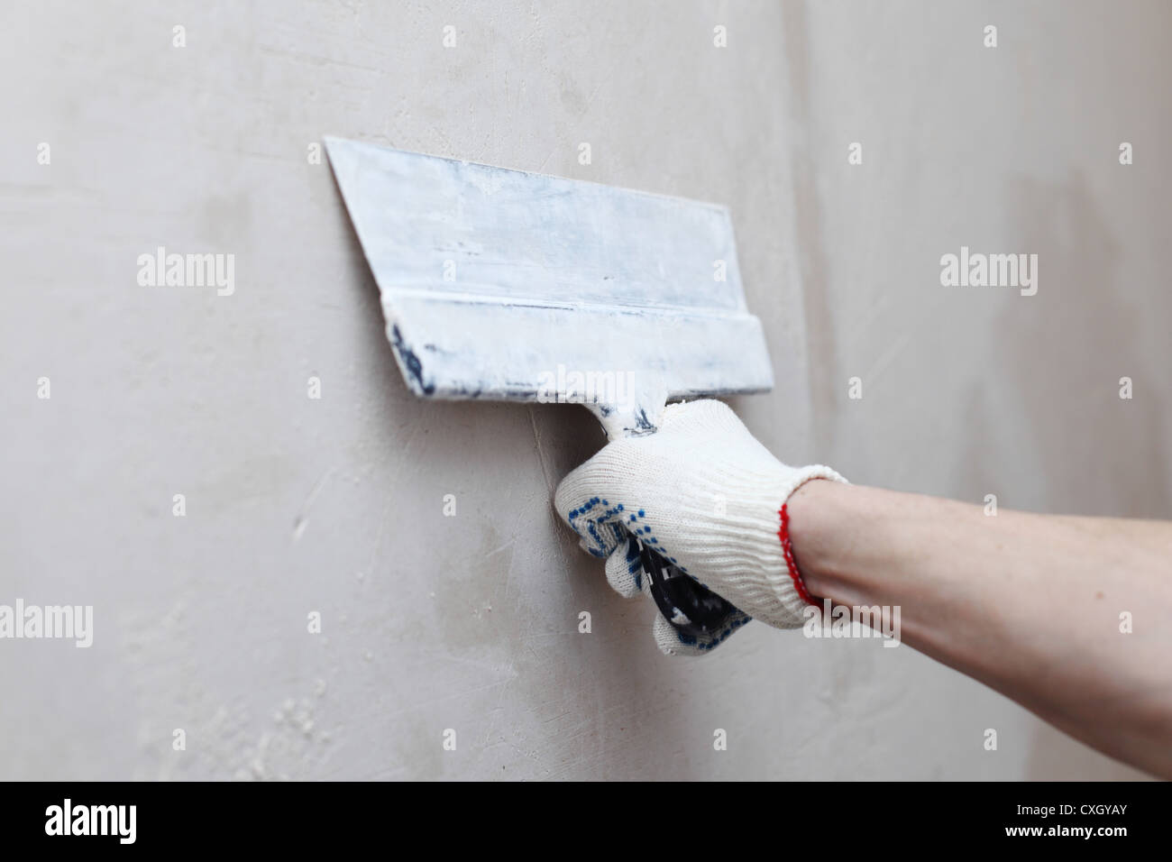 work aligns with a spatula wall Stock Photo - Alamy