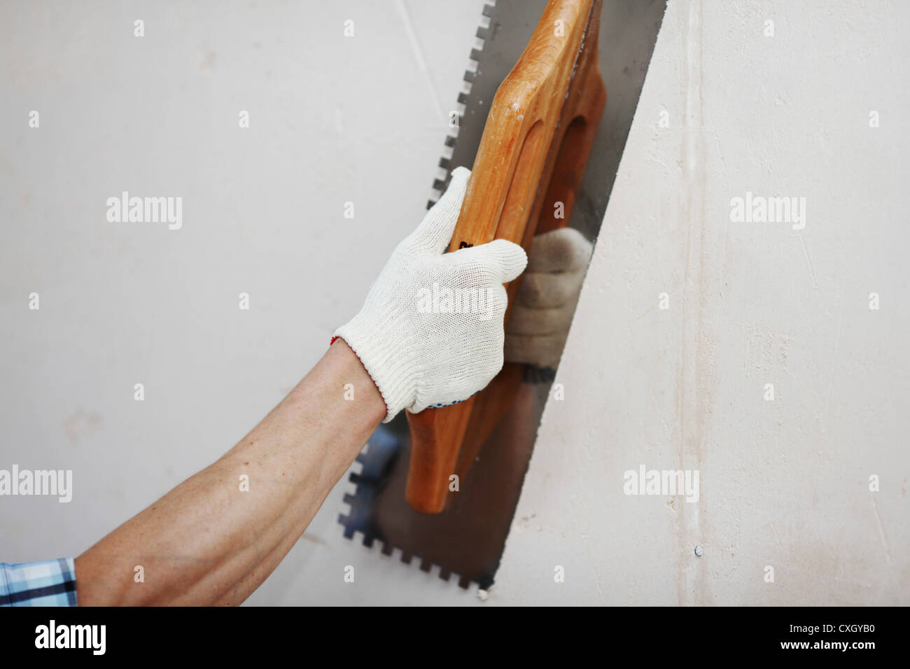 work aligns with a spatula wall Stock Photo - Alamy