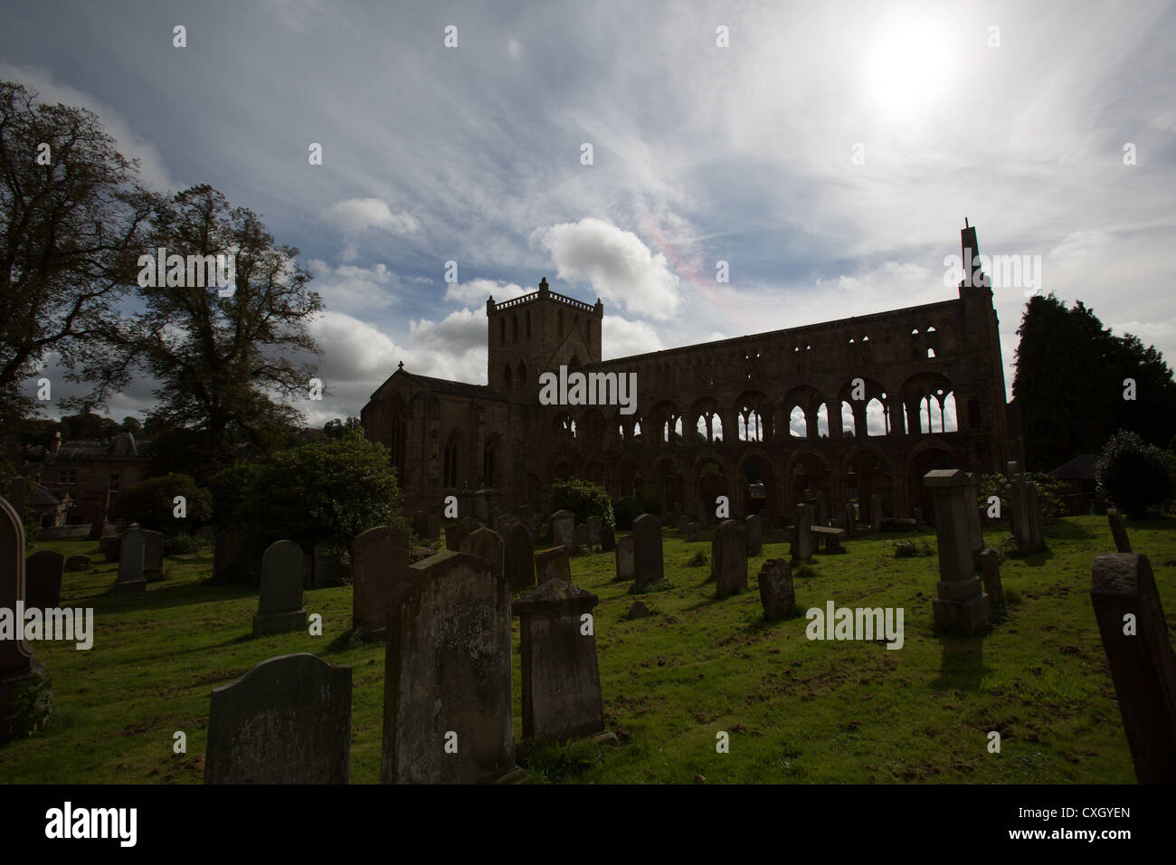Town of Jedburgh, Scotland. Silhouetted view of the graveyard and north ...