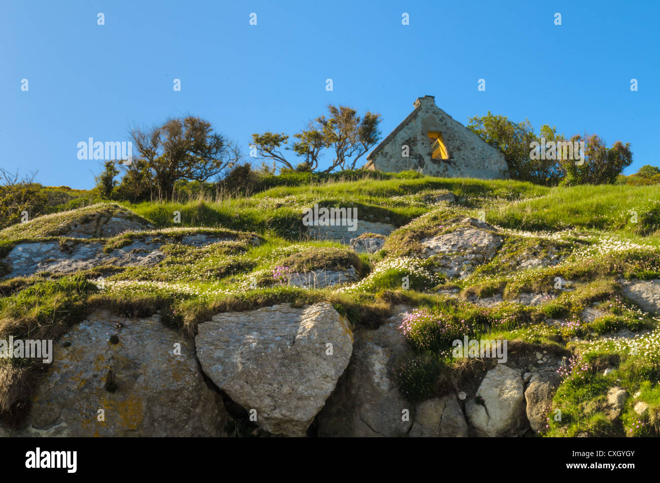 An derelict Irish Cottage sitting atop a hillside on the North Antrim ...