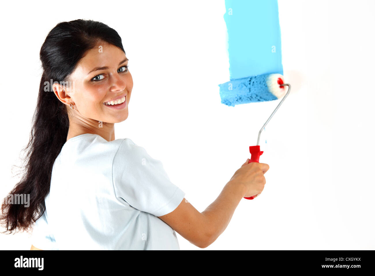 roller in woman hand paint on the wall Stock Photo - Alamy